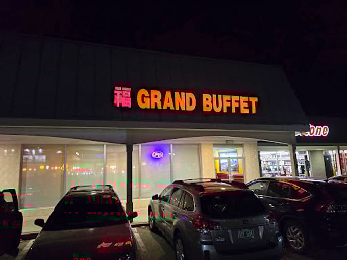 As evening falls, Grand Buffet's illuminated sign serves as a beacon for hungry diners seeking abundant options at reasonable prices.