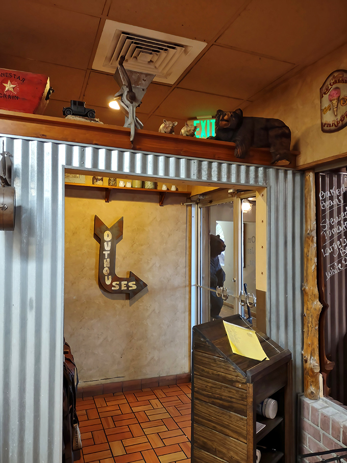 Host Stand: Boot-shaped "Outhouse" signs direct patrons to facilities &ndash; proving that at The Mason Jar, even bathroom humor maintains its country charm.