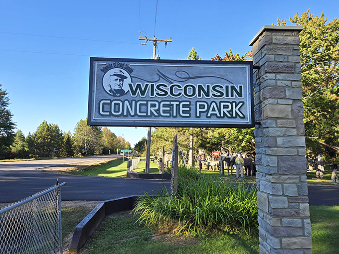 The Wisconsin Concrete Park sign stands as a beacon for curious travelers, promising an unforgettable detour into a world of concrete imagination.