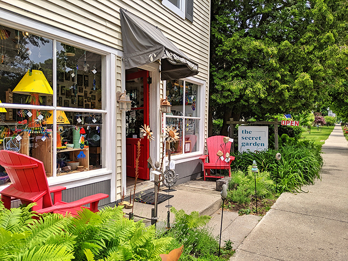 The Secret Garden shop invites passersby with colorful displays and whimsical treasures for home and garden.