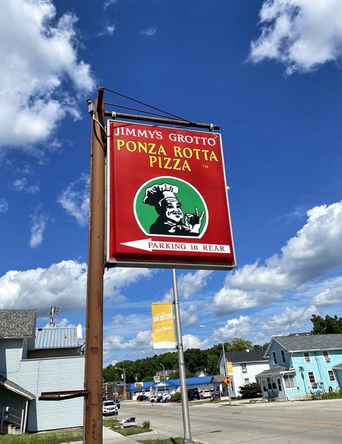 The iconic Jimmy's Grotto sign stands as a beacon of hope for the hungry, promising deep-fried delights just steps away.
