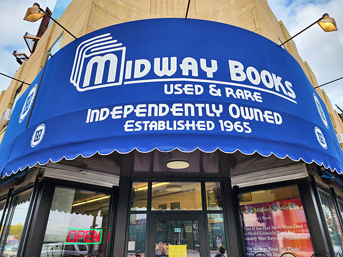 The iconic blue awning proudly announces this independent book haven's presence on University Avenue, a beacon for bibliophiles since 1965.