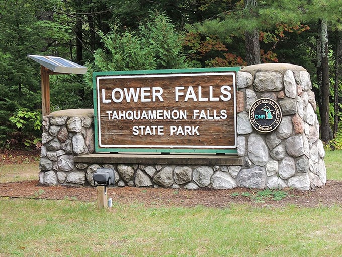 The park entrance sign stands as a promise of natural wonders ahead, like nature's version of "You are now entering awesome."