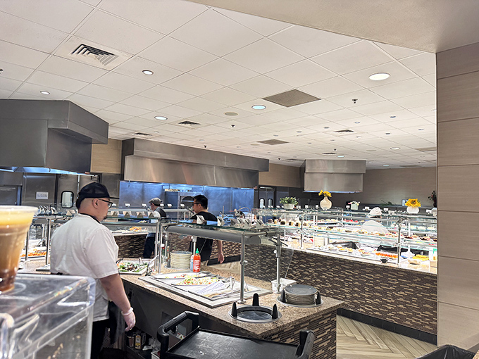 Attentive staff members keep the buffet stations immaculately maintained and freshly stocked throughout service hours.