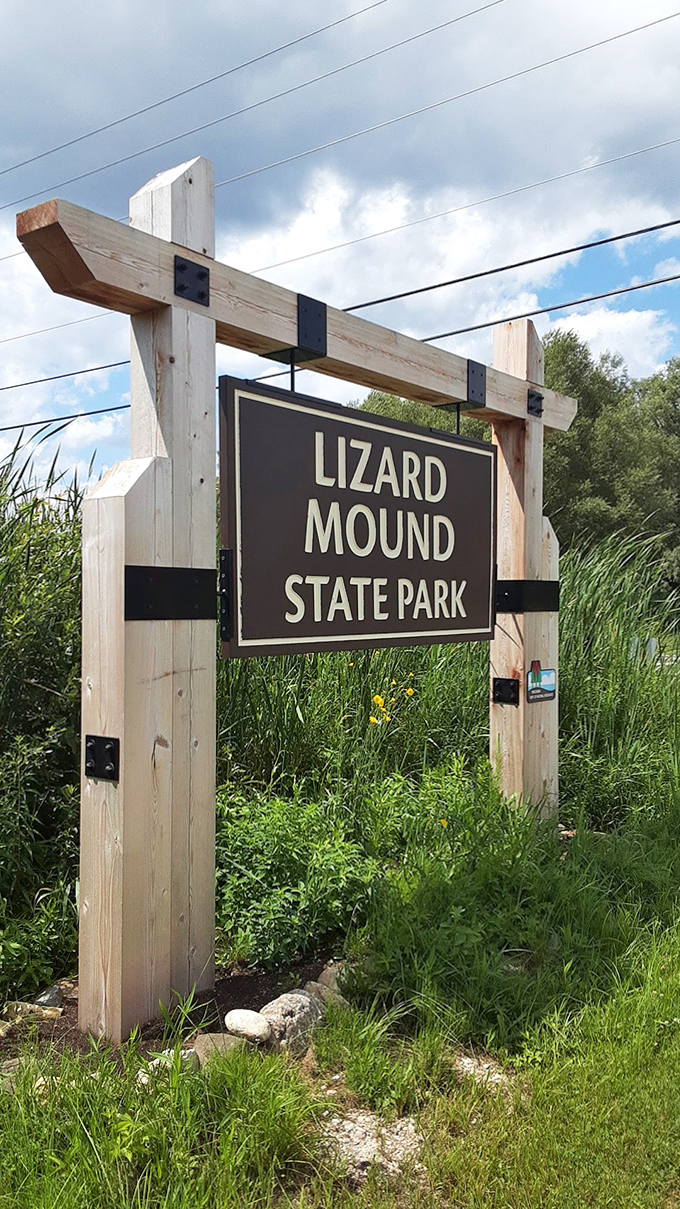 The entrance sign stands as a modern gateway to ancient wonders. Lizard Mound State Park may be Wisconsin's most understated archaeological treasure hiding in plain sight.