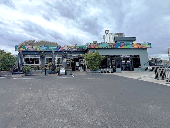 The colorful exterior stands out like a tropical oasis in the parking lot &ndash; a beacon calling hungry travelers to stop and refuel.