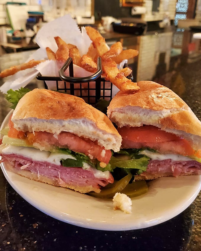 The Italian sandwich arrives loaded with meats, cheese, and veggies on fresh bread &ndash; a handheld masterpiece that requires strategic eating and extra napkins.