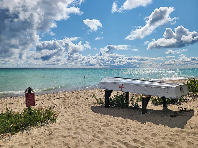 A lifeguard station watches over swimmers like a maritime sentinel &ndash; safety first, even in paradise.