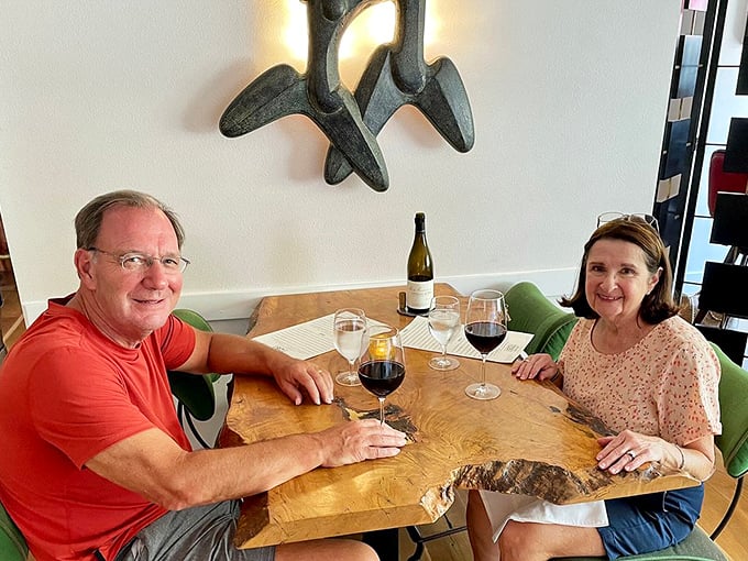 Happy diners enjoying wine and conversation &ndash; the ultimate testament to 1921's success at creating not just meals, but moments.