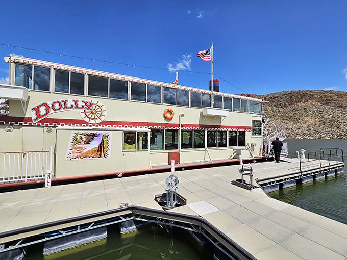The Dolly Steamboat's distinctive red and white exterior has become an iconic sight on Canyon Lake's blue waters.