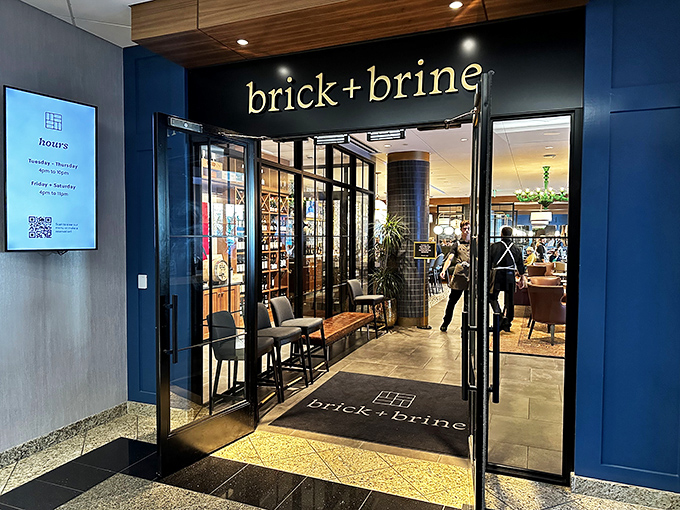 The welcoming threshold between everyday life and extraordinary dining experiences, where Brick + Brine's logo promises memorable moments ahead.