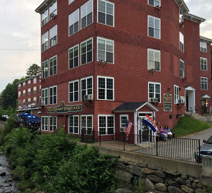This red-shingled landmark stands as a testament to thoughtful preservation, where history isn't erased but embraced as part of the dining experience.