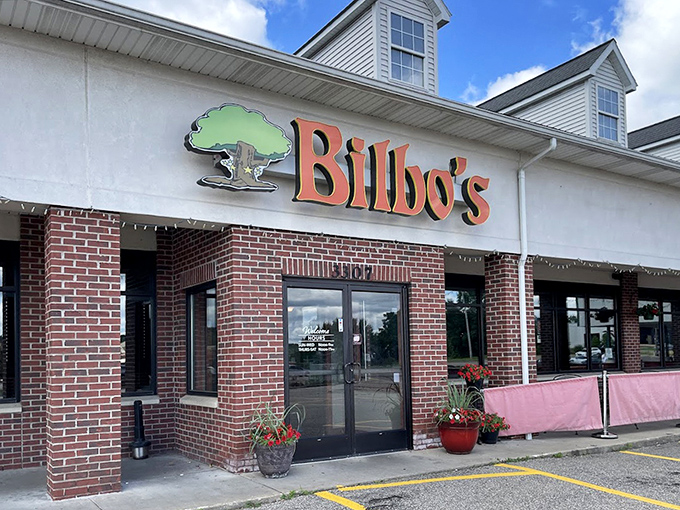 In warmer months, Bilbo's outdoor entrance welcomes hungry adventurers with cheerful planters and the promise of culinary magic within.