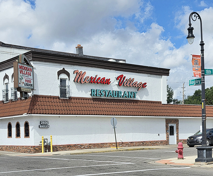 The restaurant's exterior stands as a landmark in Detroit's Mexicantown, its white walls and distinctive signage instantly recognizable to locals.