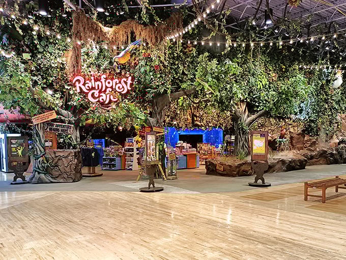 The exterior view reveals the scale of this immersive dining experience, with the iconic Rainforest Cafe sign promising adventure before you even step inside.