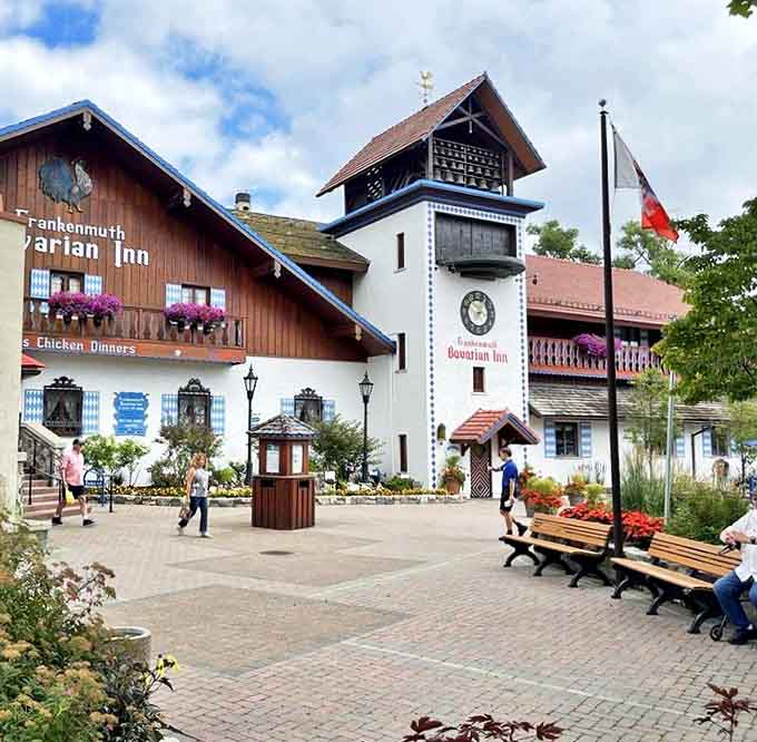 Even from the outside, the Bavarian Inn promises an authentic experience - its distinctive clock tower and wooden balconies creating an instant European escape.