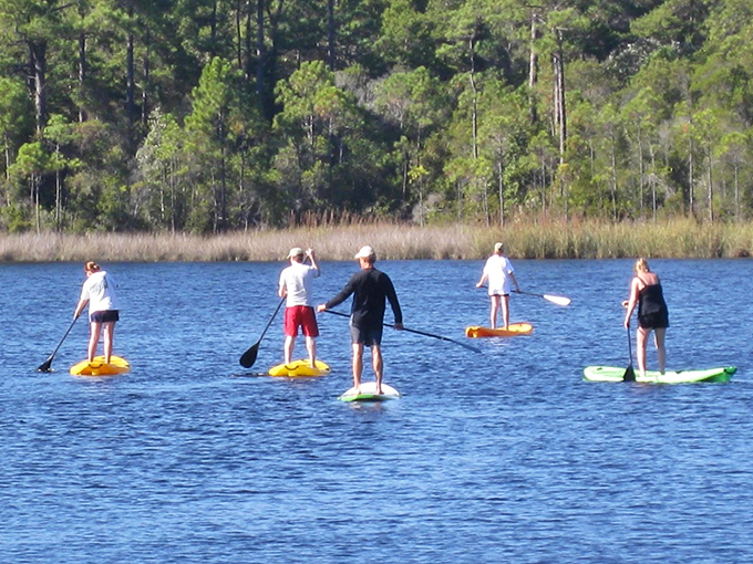 Paddle boarding on coastal dune lakes &ndash; one of nature's rare geological treats found in only a handful of places worldwide.