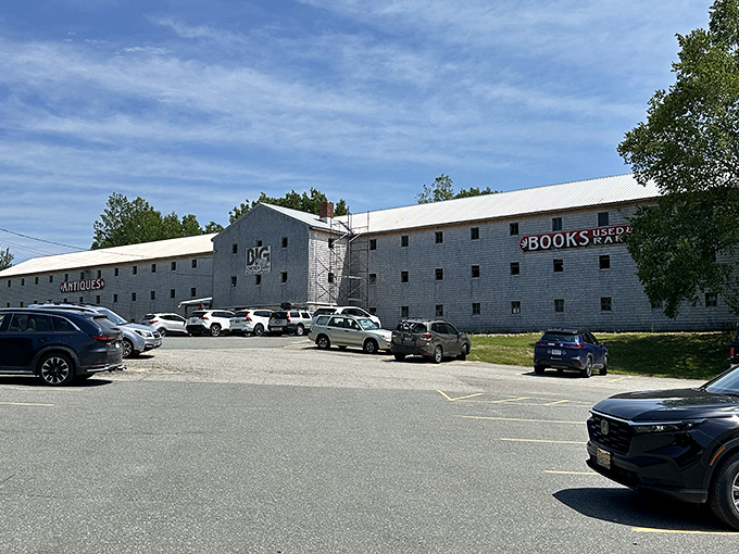 The parking lot tells the story of this hidden gem's not-so-secret popularity, where treasure hunters gather to explore Maine's largest book and antique emporium.