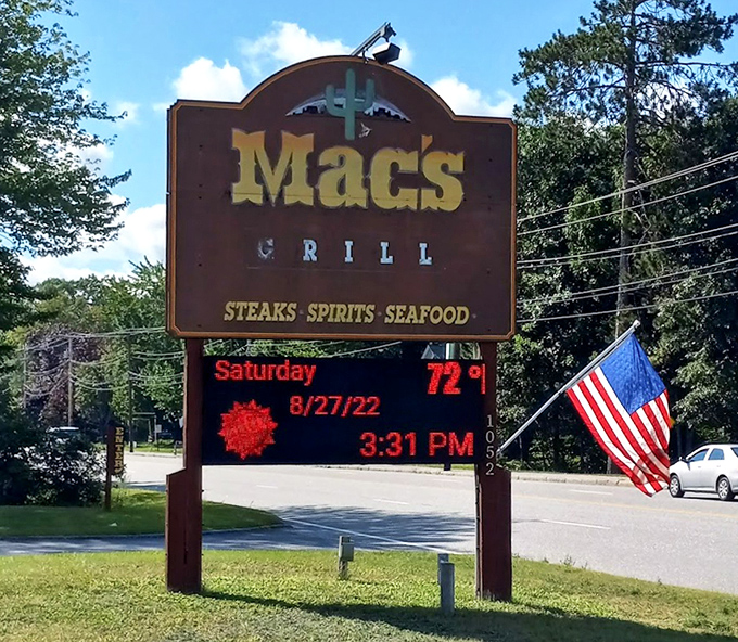 Mac's iconic sign stands tall along Minot Avenue &ndash; a beacon for hungry travelers and locals alike, promising satisfaction just beyond its doors.