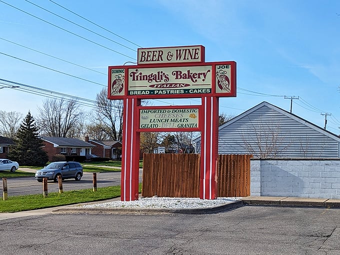 The roadside sign stands tall, a landmark for locals and a beacon for those wise enough to exit the highway for a taste of Italian-American heritage.