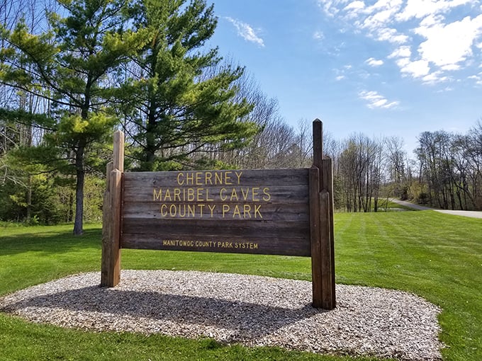The welcoming sign to Cherney Maribel Caves County Park promises natural wonders and historical mysteries. Wisconsin's version of "Abandon hope all ye who enter"—but friendlier!
