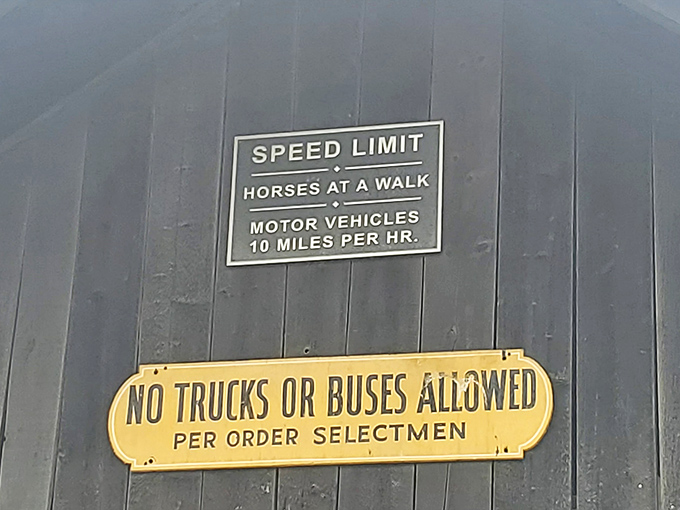 The bridge's weight limit sign – a reminder that this historical structure still serves practical purposes despite its supernatural reputation.