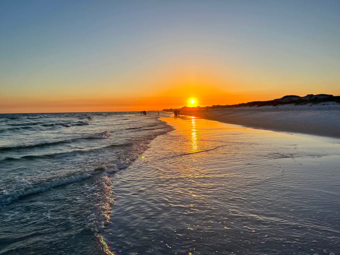 Golden hour perfection: The day's final light paints Grayton's shoreline in warm hues, proving why this beach consistently ranks among America's most beautiful.