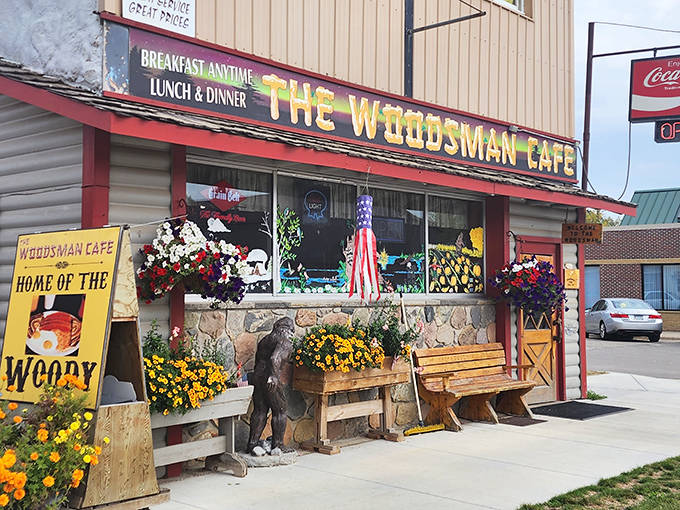 Flower boxes and rustic benches welcome visitors to a place where Bigfoot memorabilia meets breakfast perfection.