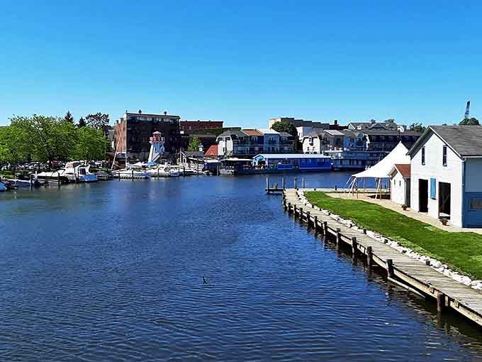 South Haven's charming downtown welcomes visitors with American flags, colorful storefronts, and a distinctly nautical atmosphere.