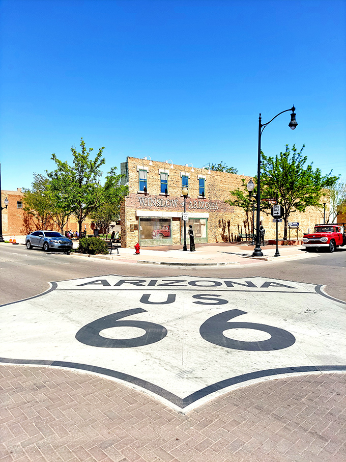 The giant Route 66 shield painted on the street reminds visitors they're standing at the intersection of music history and highway lore.