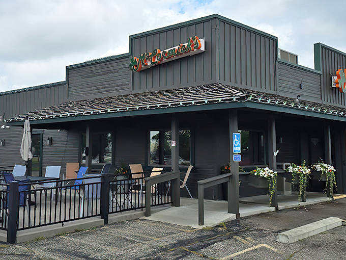 McCormick's exterior welcomes hungry travelers with its distinctive green sign and promise of homestyle comfort that'll make your stomach growl with anticipation.