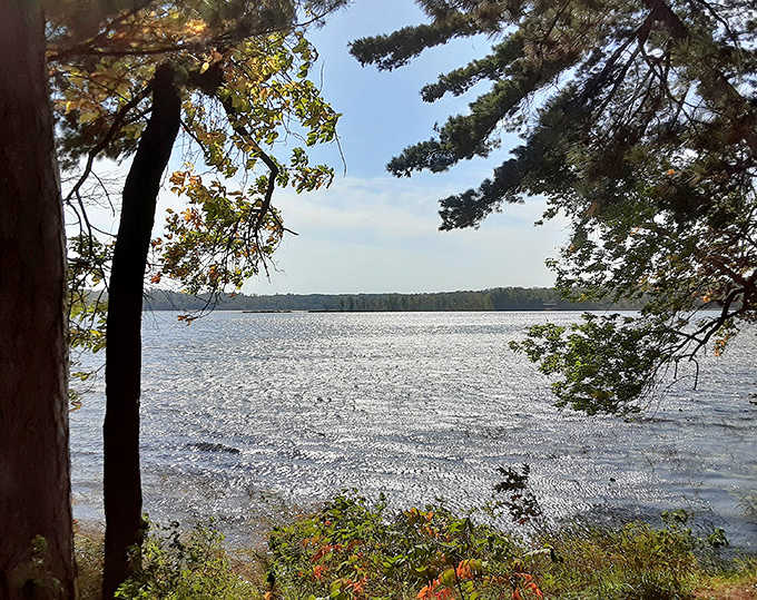 Sunlight dances across Pillsbury's pristine waters, creating a shimmering canvas that rivals any art gallery. Nature's masterpiece on full display.