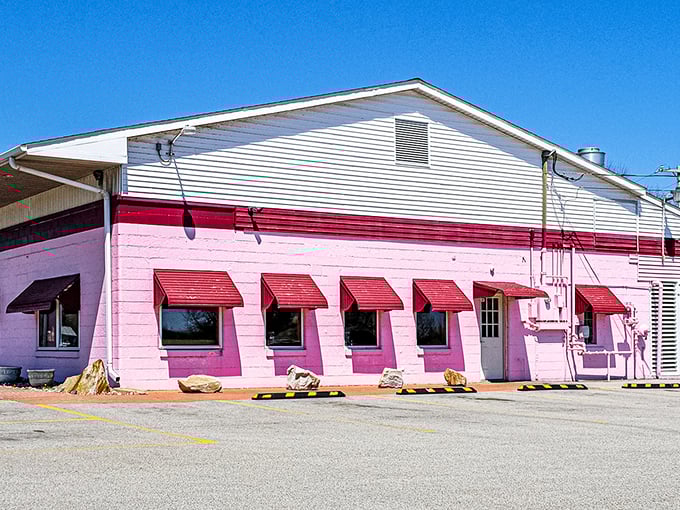 The unmistakable pink exterior of Turkey Roost stands out like a beacon of comfort food, promising turkey treasures within those welcoming walls.