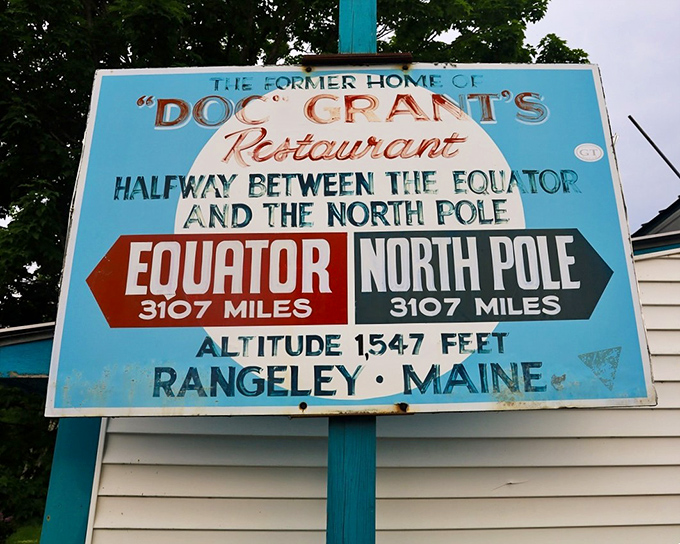 The famous blue sign marking the exact midpoint between the equator and North Pole. Geography lesson and photo op in one!