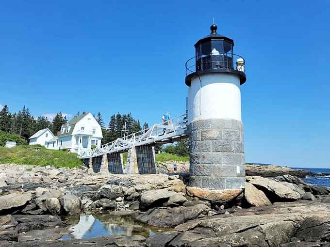 Marshall Point Light stands proud on the rocky Maine coast, looking exactly like it did when Forrest Gump stopped running here.