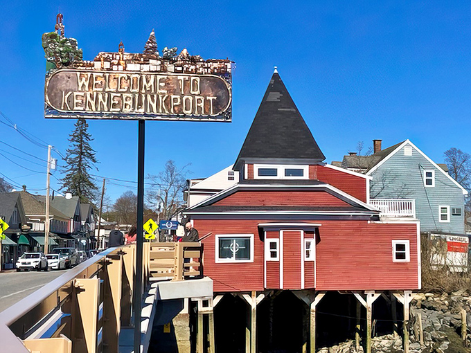 Kennebunkport's iconic welcome sign stands tall, adorned with nautical treasures that hint at the maritime charm awaiting visitors below.