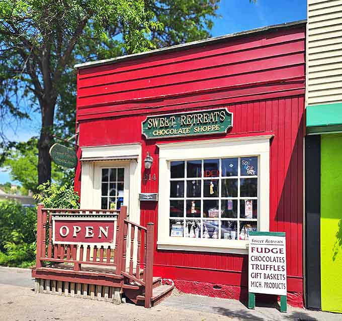 Sweet Retreats' cherry-red storefront stands out in Milford like a Valentine's Day card come to life. The "OPEN" sign practically whispers, "Chocolate awaits!"