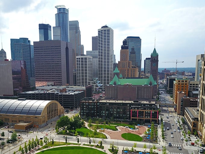 Minneapolis skyline stands tall and proud, with the iconic gold-domed City Hall catching the afternoon light like a beacon for urban adventurers.