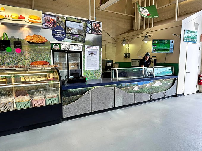 Valley View Orchards' gleaming display case showcases a rainbow of whoopie pie flavors, tempting customers with sweet possibilities behind spotless glass.