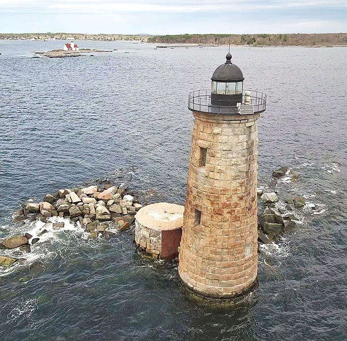 Whaleback Light stands like a stone sentinel where the Piscataqua River meets the Atlantic, its granite blocks defying waves and time.