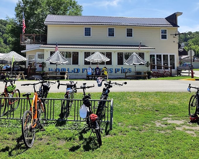 Bicycles line up outside Aroma Pie Shoppe, where hungry cyclists refuel with slices of heaven after riding the nearby trail.