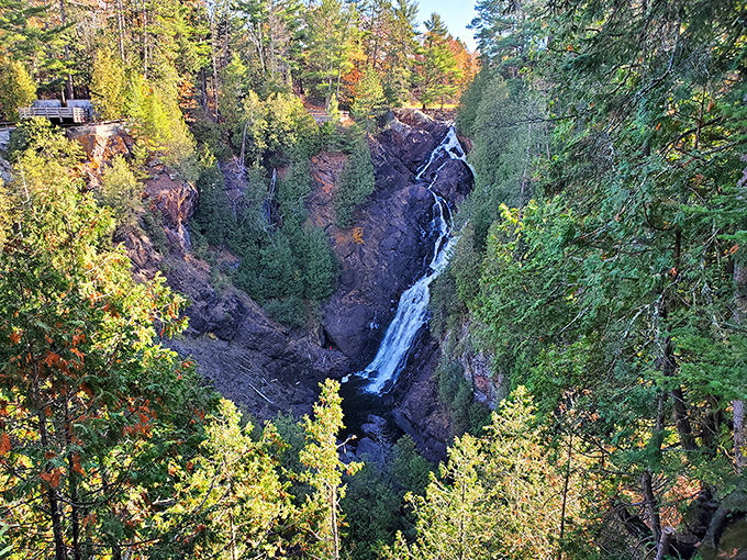 Wisconsin's tallest waterfall puts on a spectacular show as it plunges 165 feet down, framed by vibrant forest and rocky outcroppings.