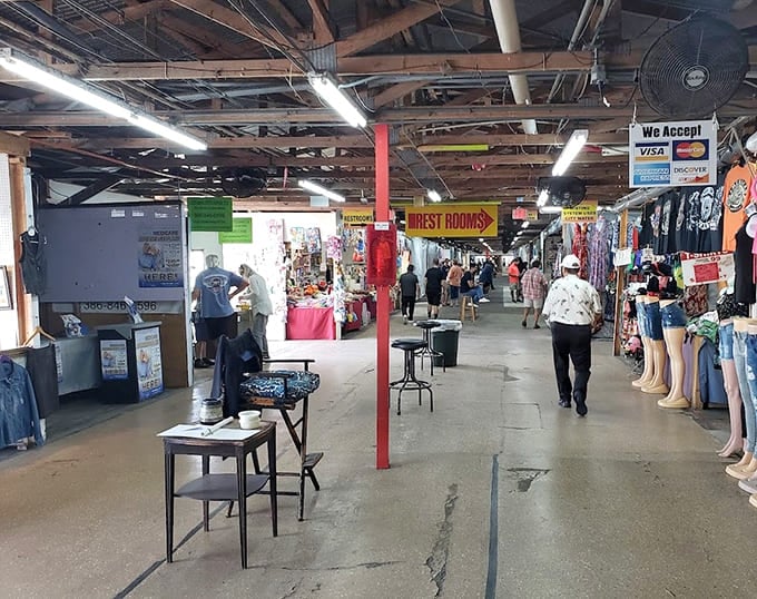 Rows of colorful golf carts and outdoor gear create a shopper's paradise under one massive roof.