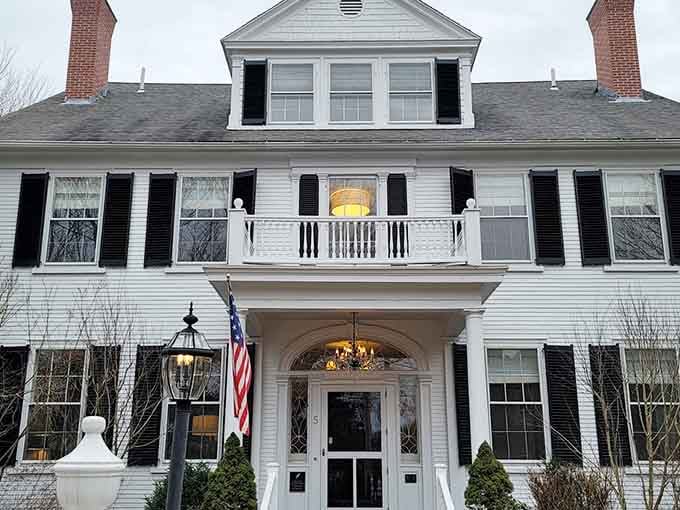 Historic elegance meets natural beauty when lupines bloom around these traditional Maine buildings.