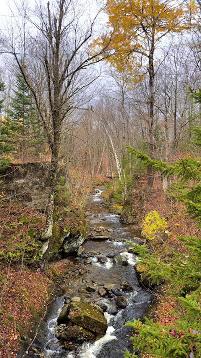 Fall colors frame this woodland treasure, where water meets rock in a dance that's been perfecting its moves for thousands of years.