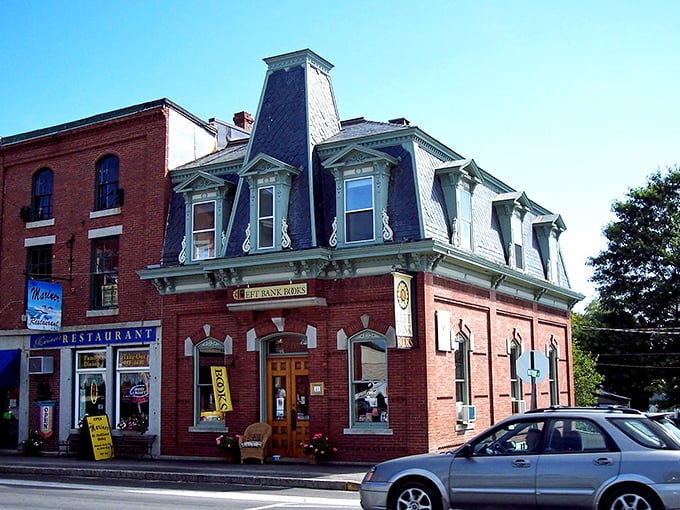 A distinctive red brick building with a mansard roof anchors Searsport's downtown, preserving the town's 19th-century maritime heritage.