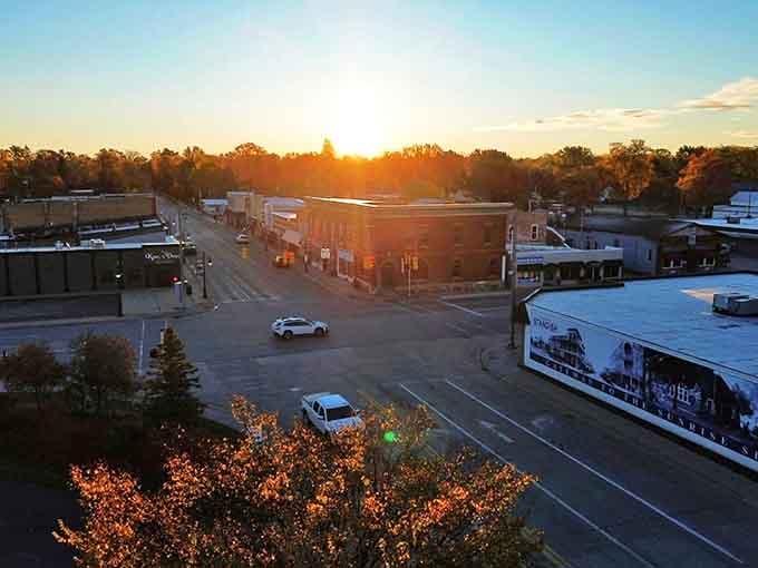 Sunset bathes downtown Standish in golden light, transforming ordinary streets into a postcard-perfect scene.