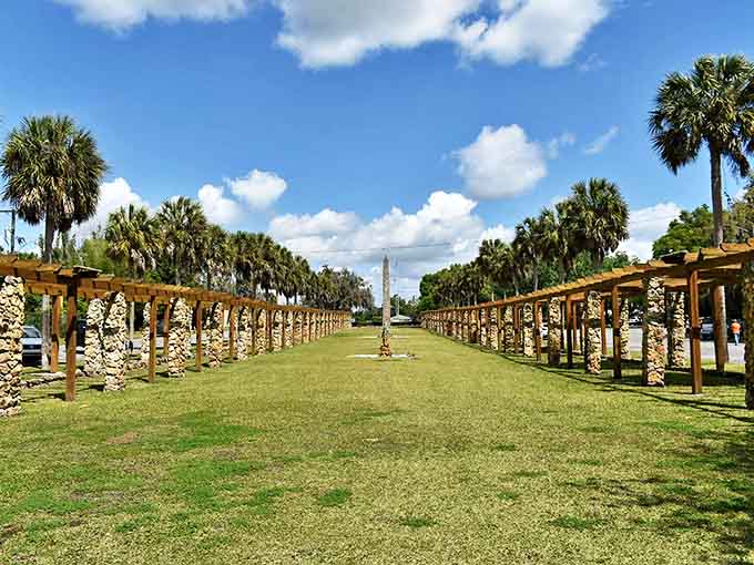 That 60-foot obelisk stands like Florida's way of saying "we can do monuments too," surrounded by palms and perfectly manicured grounds.