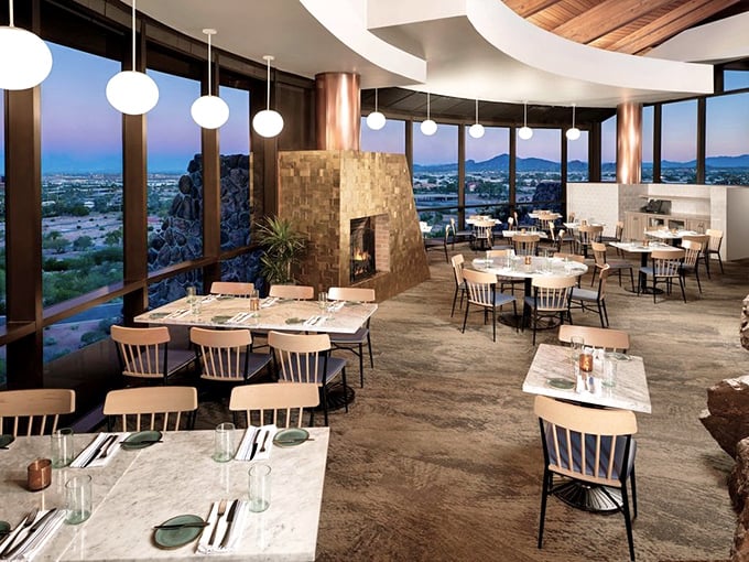 Sunset transforms this circular dining room into a cathedral of light, where every table offers front-row seats to Arizona's painted sky.