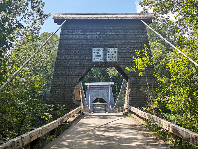 Warning signs tell the tale: this isn't your average crossing. Three tons maximum, and please, no racing across this venerable structure.